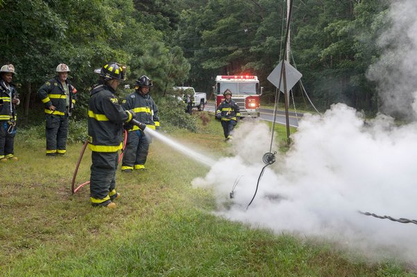 Car Crashes Into Utility Pole In East Hampton Causing Fire - 27 East