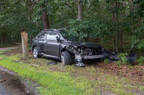 Car Crashes Into Utility Pole In East Hampton Causing Fire - 27 East